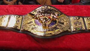 The Rock Receives New Championship Belt During WWE Hall Of Fame ...